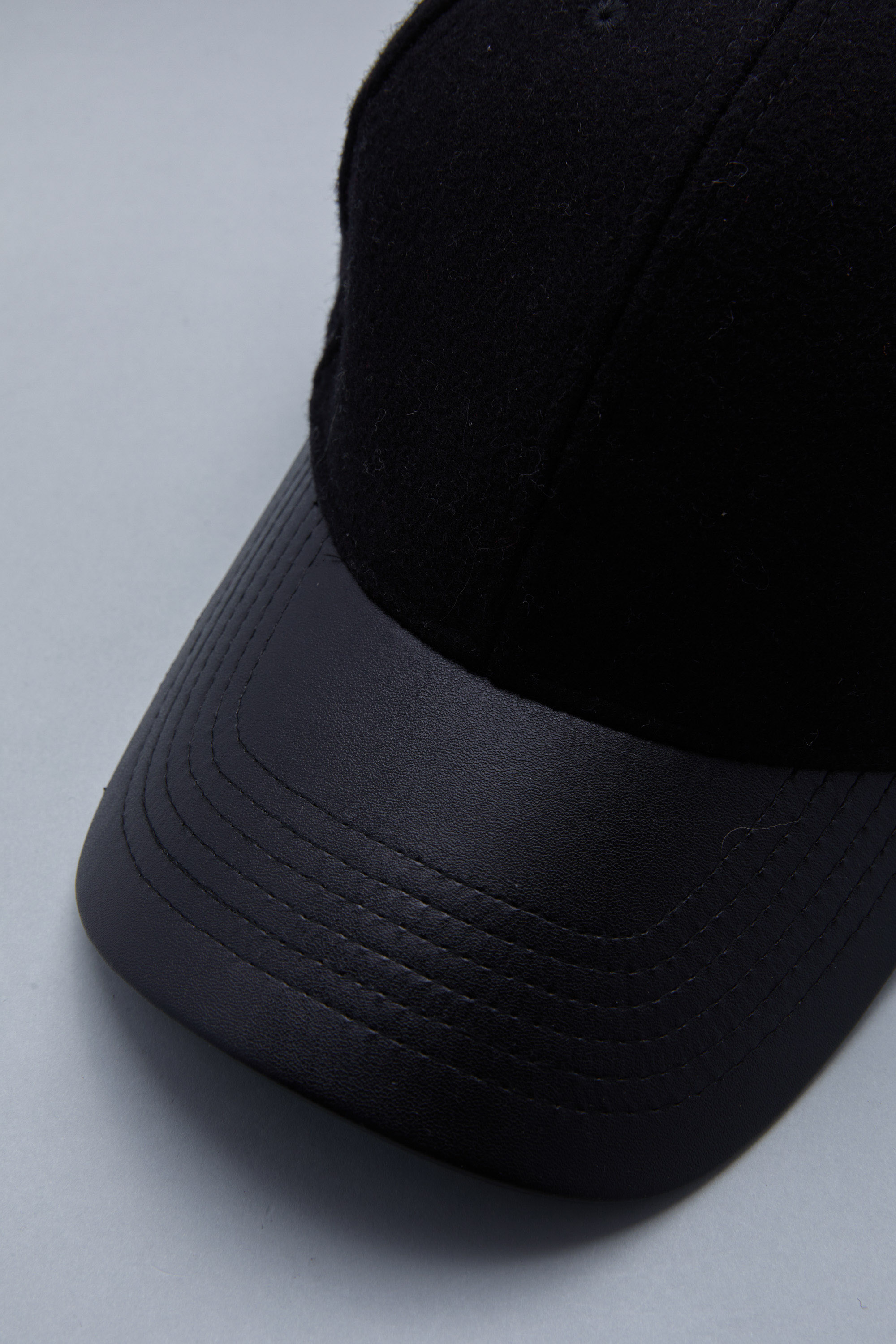 5 Panel Black Wool Cap In Vegan Leather Peak | Aristoteli Bitsiani